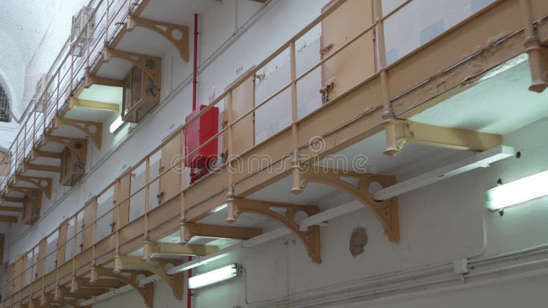 Metal Balcony with Prison Cell Doors. Interior of Prison Corridor ...