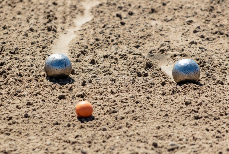 Metal Balls on the Sandy Beach. Stock Photo - Image of game, water ...