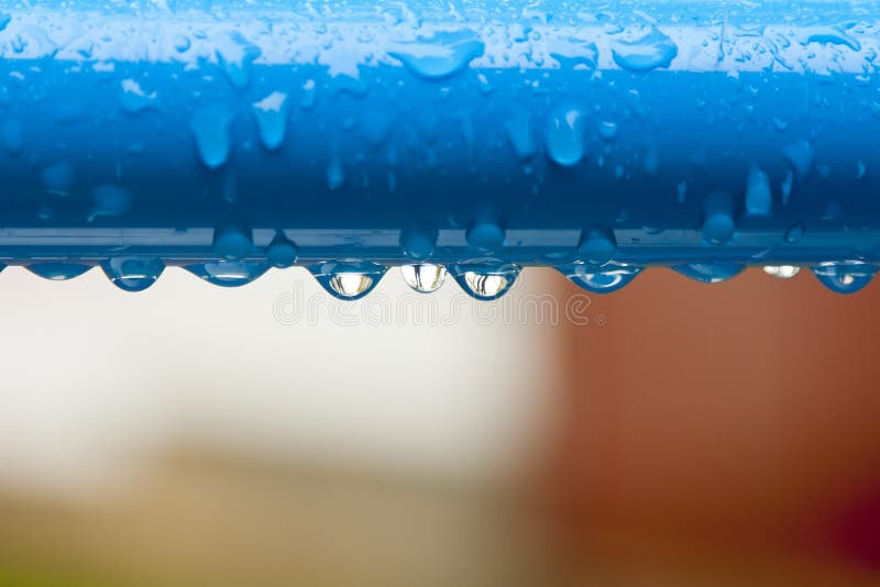 A Metal Bar with Many Water Drops Stock Photo - Image of colorful ...