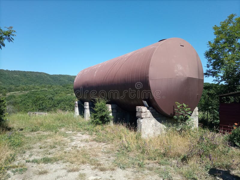 A Metal Barrel in the Forest. a Water Tank. a Large Container for ...