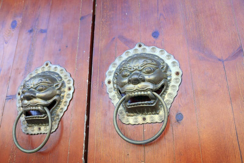 Metal beast head knocker stock image. Image of access - 390093435