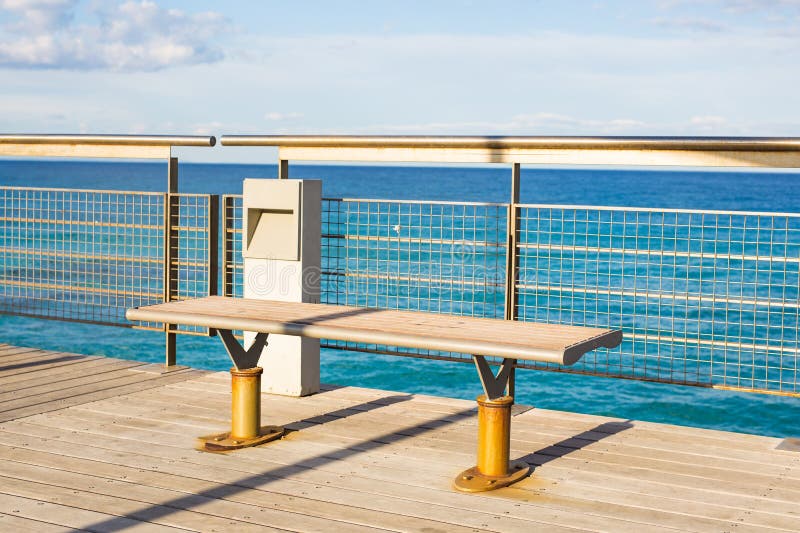 Metal Bench in Front of the Sea Stock Photo - Image of bench, sand ...
