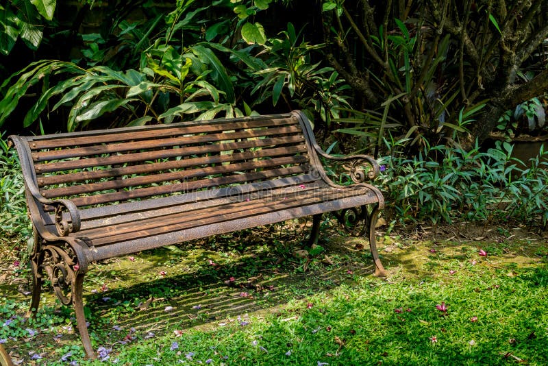 Metal bench on green grass stock image. Image of metal - 91978273