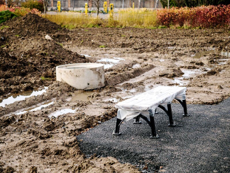Metal Bench Installed, Park Renovation. Ground Work in Progress Stock ...
