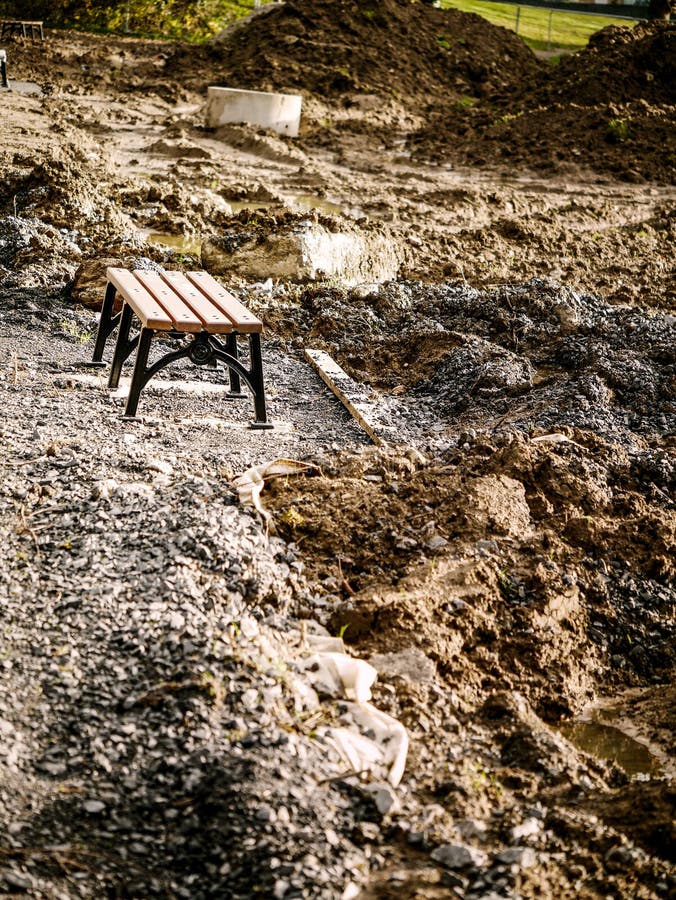 Metal Bench Installed, Park Renovation. Ground Work in Progress Stock ...