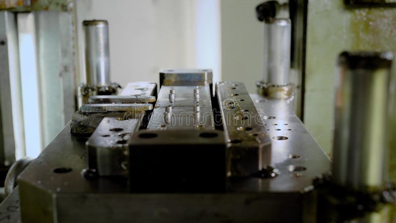 Metal Bending Machine in Process, Bending Small Metal Sheets. Stock ...