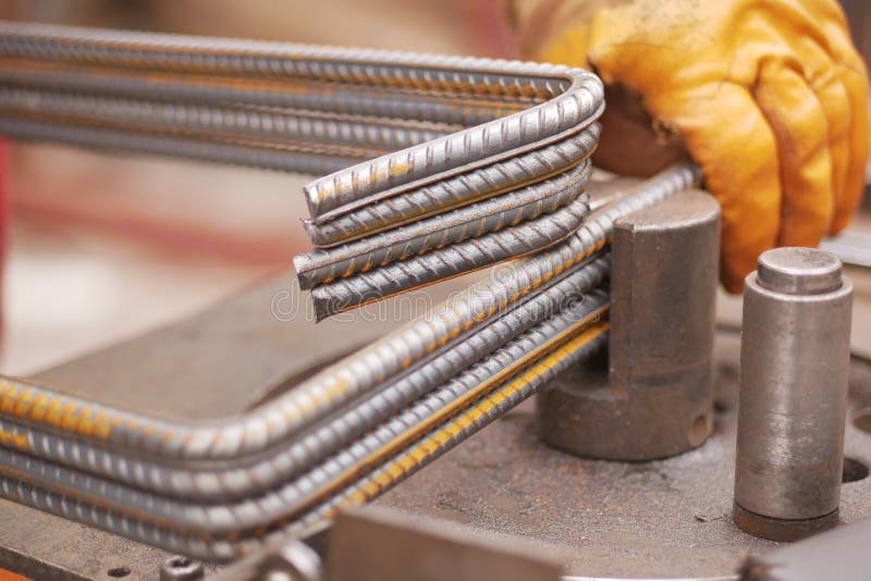 Metal Bending Process in Construction Site Workshop during Daytime ...