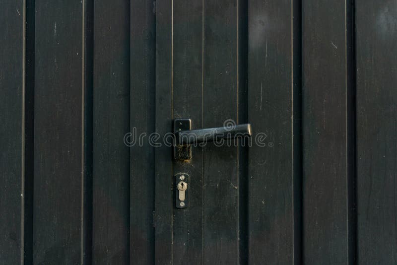Metal Black Door with a Black Handle for Background. Black Metal Door ...
