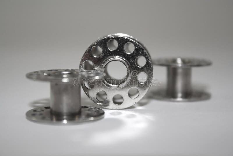 Metal bobbins stock image. Image of silver, alterations - 12707169
