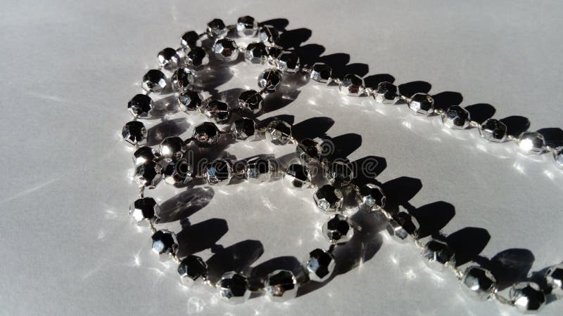 Metal Bracelet in the Form of a String of Silver Beads Stock Image ...