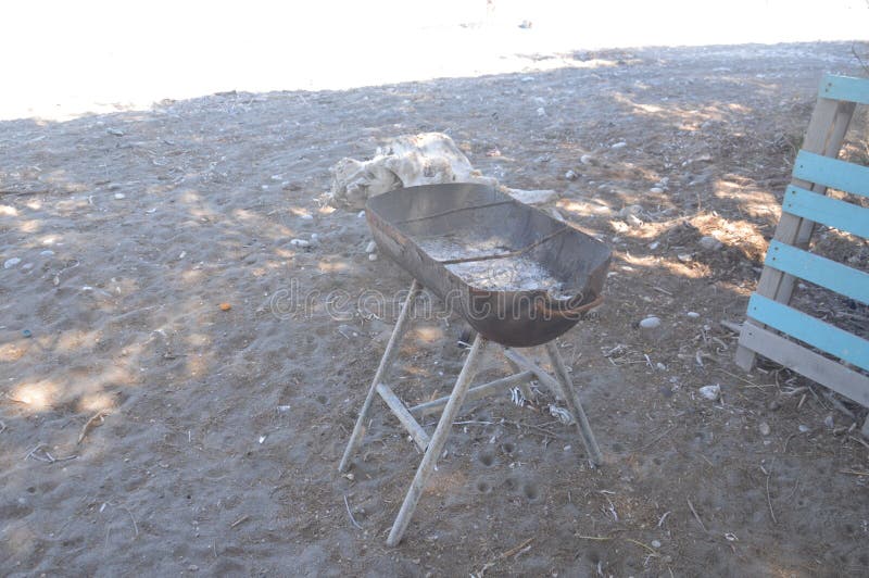 Metal Brazier for Cooking Meat Stands on the Sand Stock Photo - Image ...