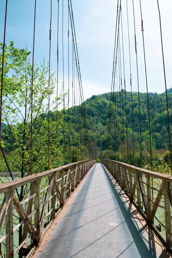 Narrow Metal Bridge Over a Mountain River. Stock Image - Image of view ...