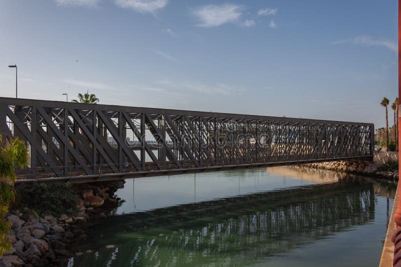 Metal Bridge Over River in Malaga Stock Photo - Image of skyline ...