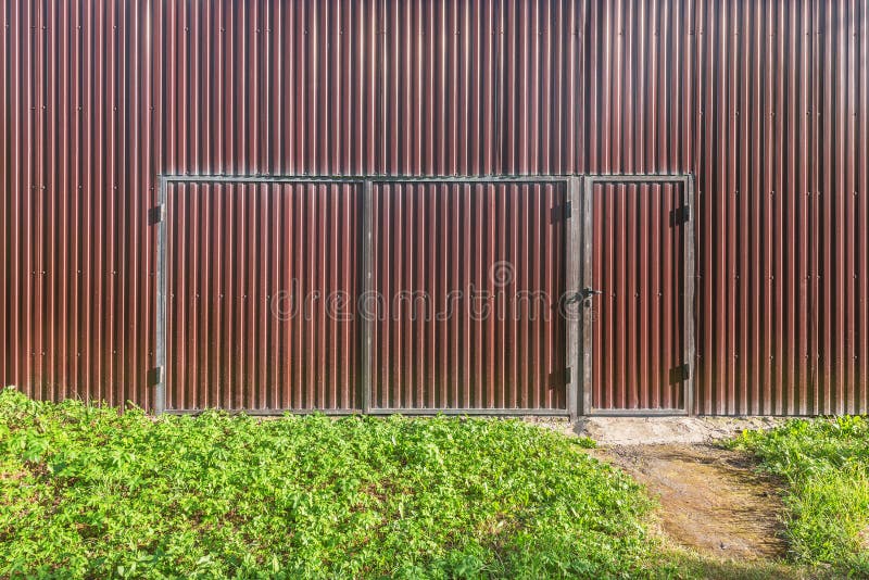 Metal Brown Gate by the House Stock Photo - Image of armed, door: 223494734