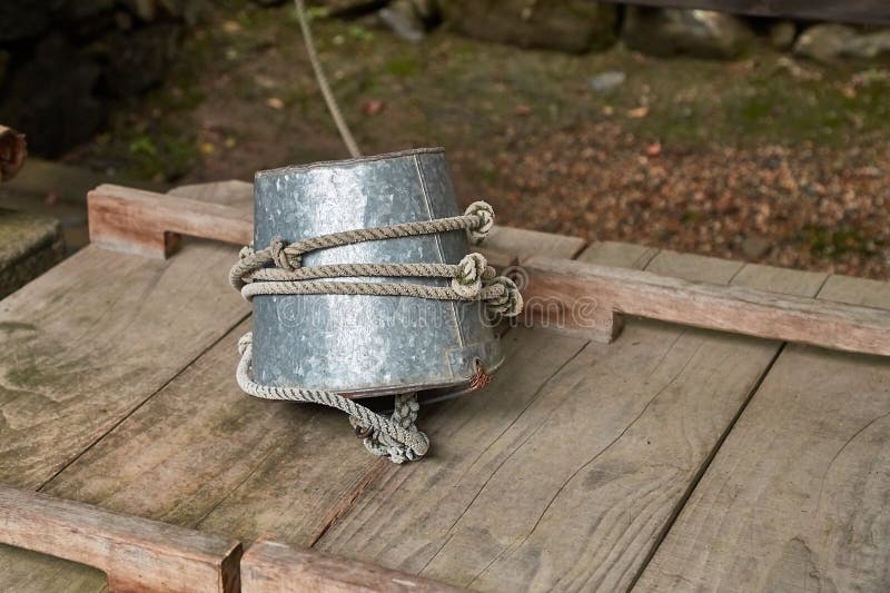 Metal bucket for a well stock photo. Image of homestead - 236325408