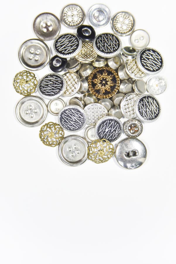 Metal Buttons of Different Shape and Size on the White Background ...
