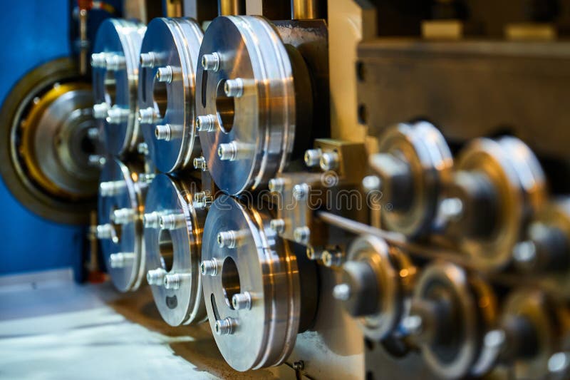 Metal Cable Pulled Out through Rollers Line on Machine Tool Stock Image ...