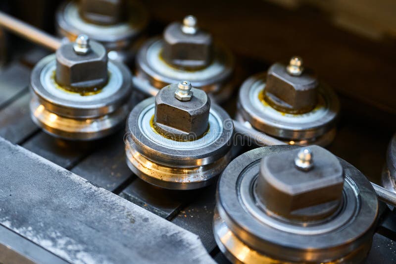 Metal Cable Pulled Out through Rollers Line on Machine Tool Stock Image ...