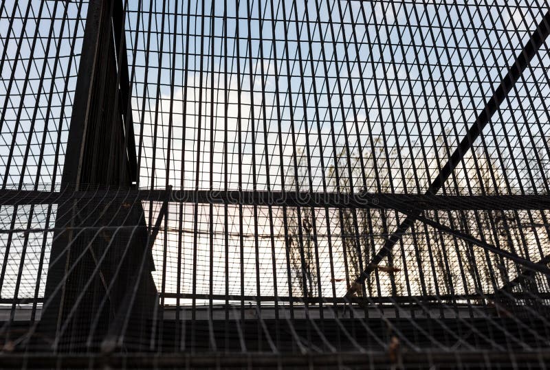 Metal cage in a prison stock image. Image of protection - 206297005
