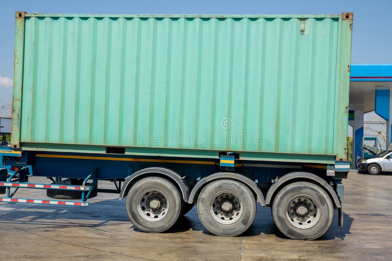 A Metal Cargo Container on Truck Trailer Parked. Container on Trailer ...