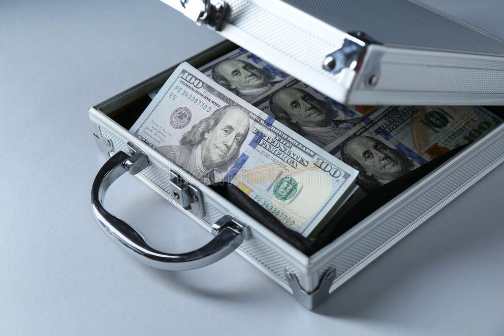Metal Case Full of Dollar Banknotes on Light Background Stock Image ...
