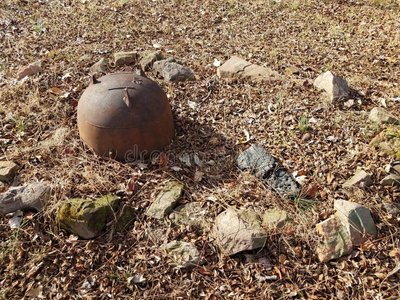 Metal Cauldron and Burned Wood with Rocks Stock Image - Image of ...