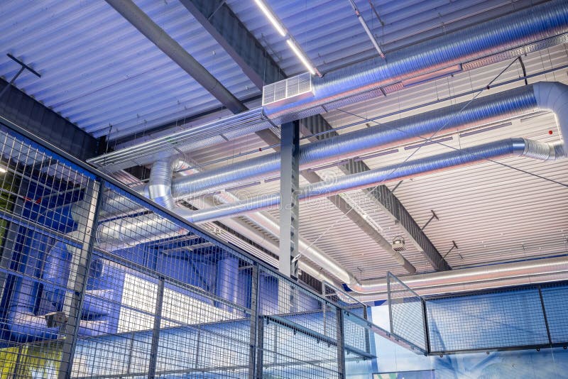 Industrial Ceiling with Metal Beams, Ventilation Ducts, and Fluorescent ...