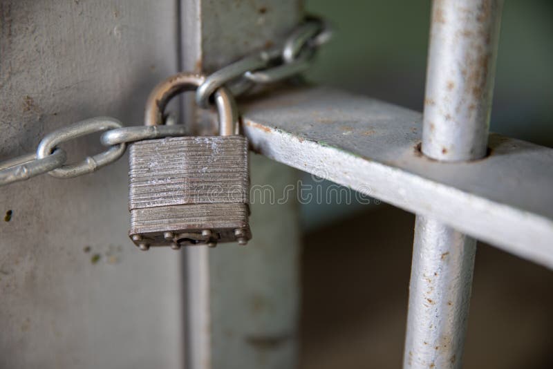 Chaing and Lock Holding a Door Closed Stock Photo - Image of burglary ...