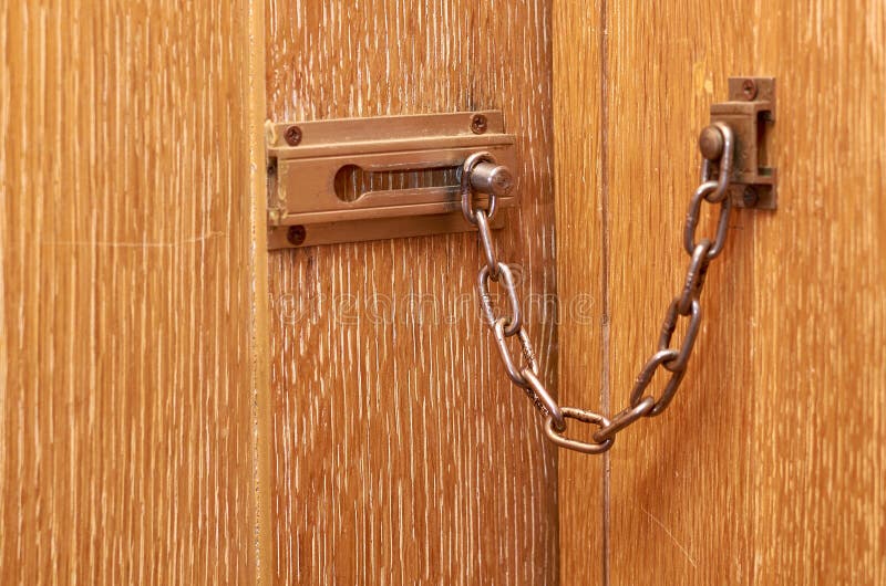 Metal Chain Lock on the Wooden Front Door Stock Image - Image of ...