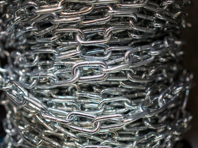 A Metal Chain Wound in a Small Coil Stock Image - Image of iron ...