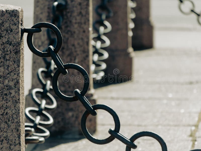 Metal Chains on a City Street. Fence Stock Photo - Image of barrier ...