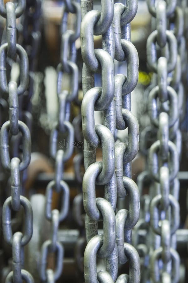 Metal chains in a factory stock image. Image of sequence - 2430619