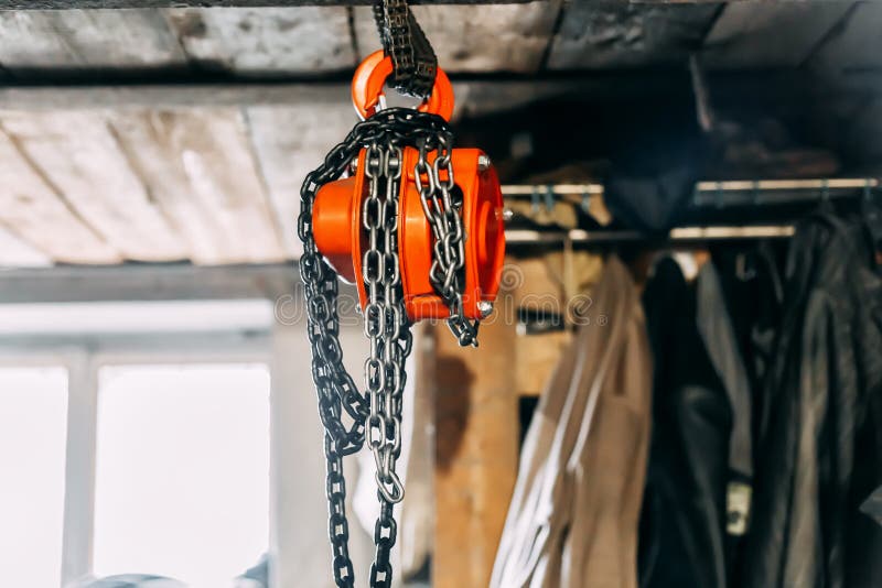 Metal Chain on Ceiling in Garage for Work Stock Photo - Image of chain ...