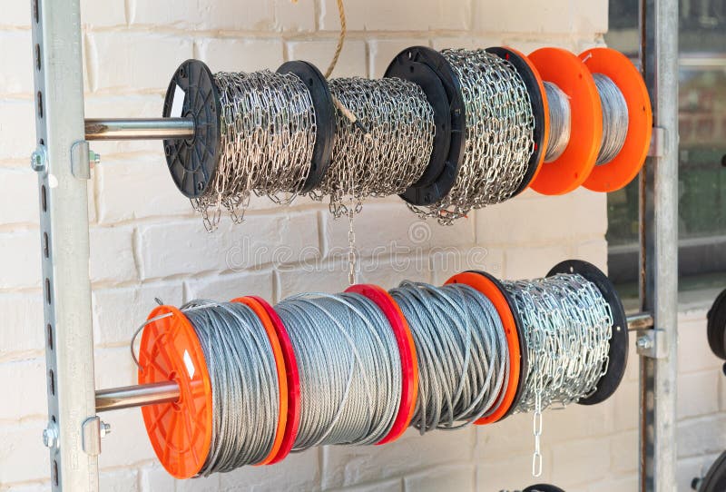 Metal Chains and Steel Cables Wound on Coils. Organization and Storage ...
