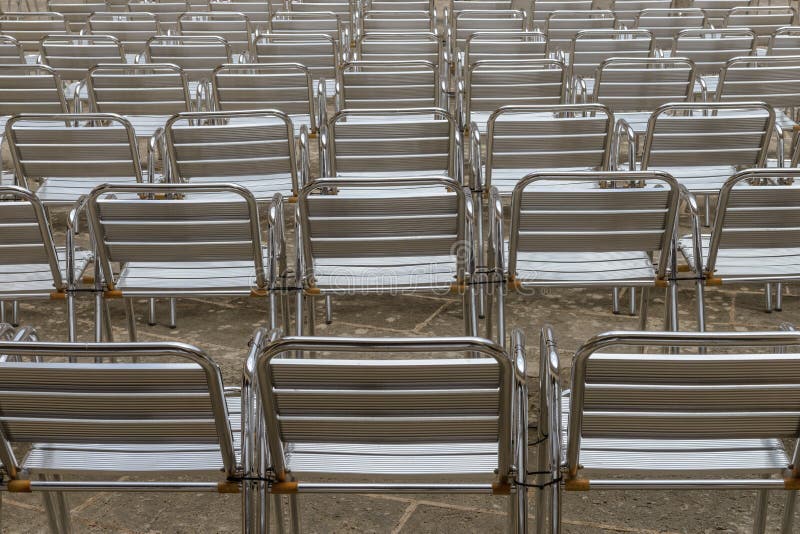 Metal Chairs Arranged in a Row Stock Image - Image of modern, group ...