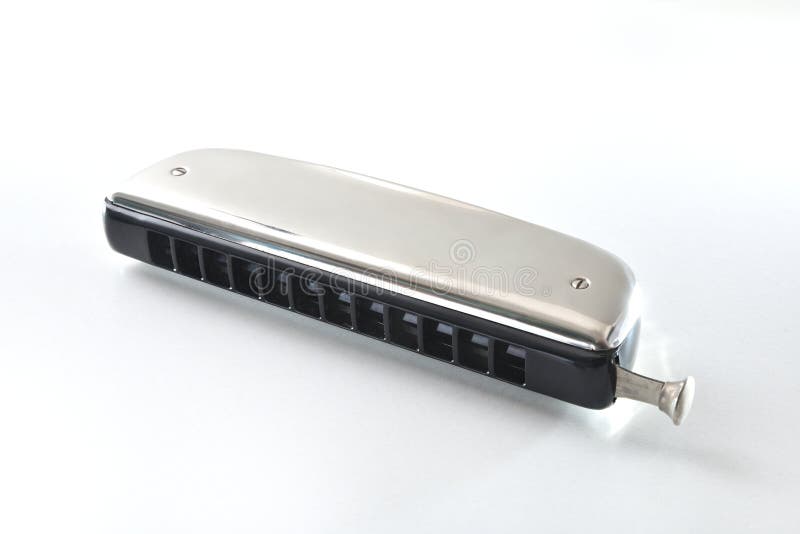 Metal Chromatic Harmonica Isolated on White Table Elevated View Stock ...