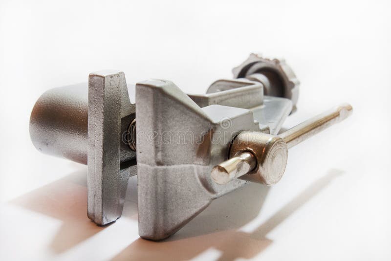 Metal Clamps on the White Table Stock Image - Image of iron, metal ...