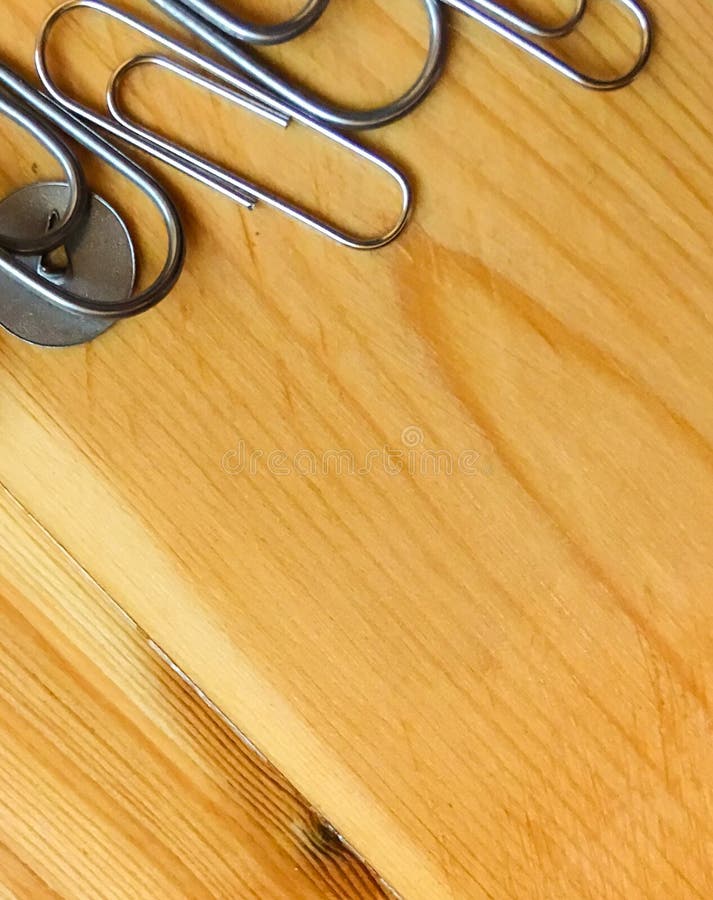 Metal Clips and Pins on a Wooden Table. Place for Text Stock Photo ...