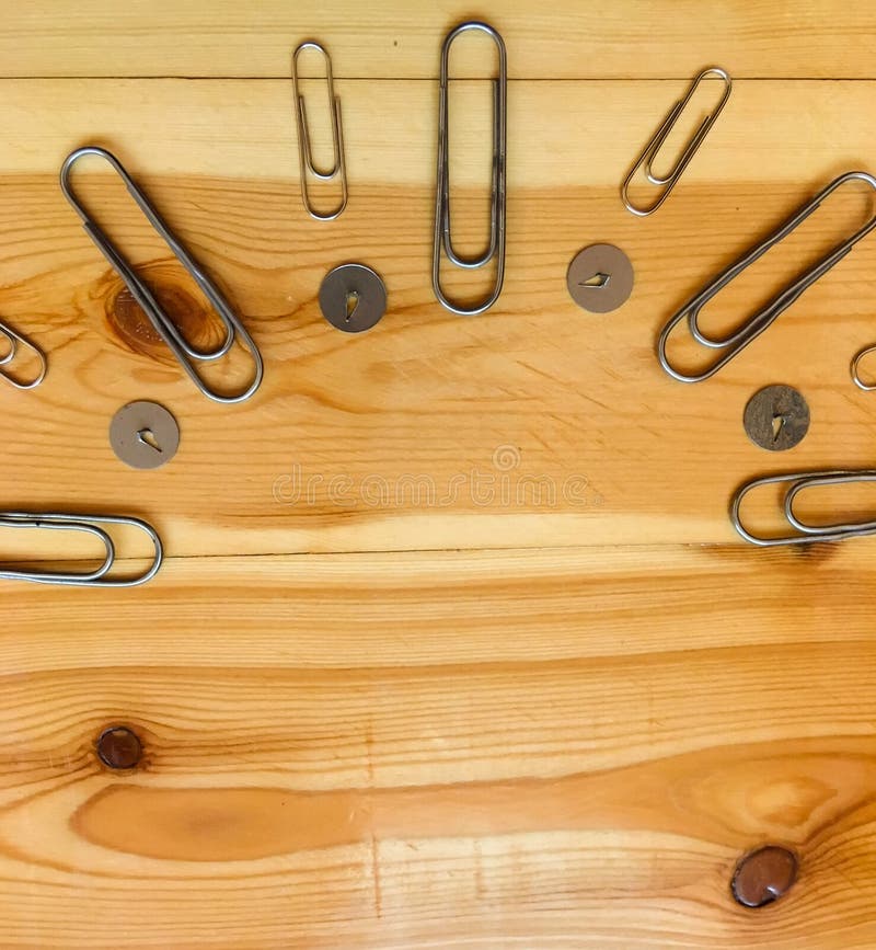 Metal Clips and Pins on a Wooden Table. Place for Text Stock Image ...