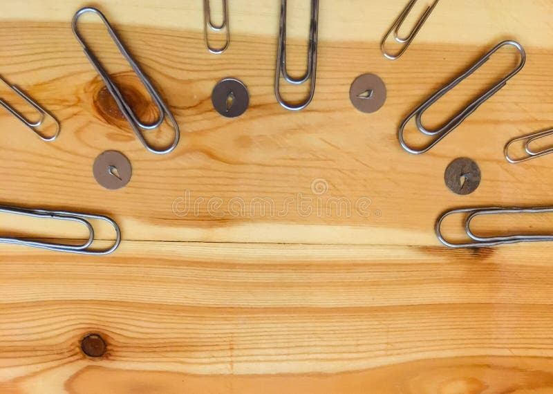 Metal Clips and Pins on a Wooden Table. Place for Text Stock Image ...