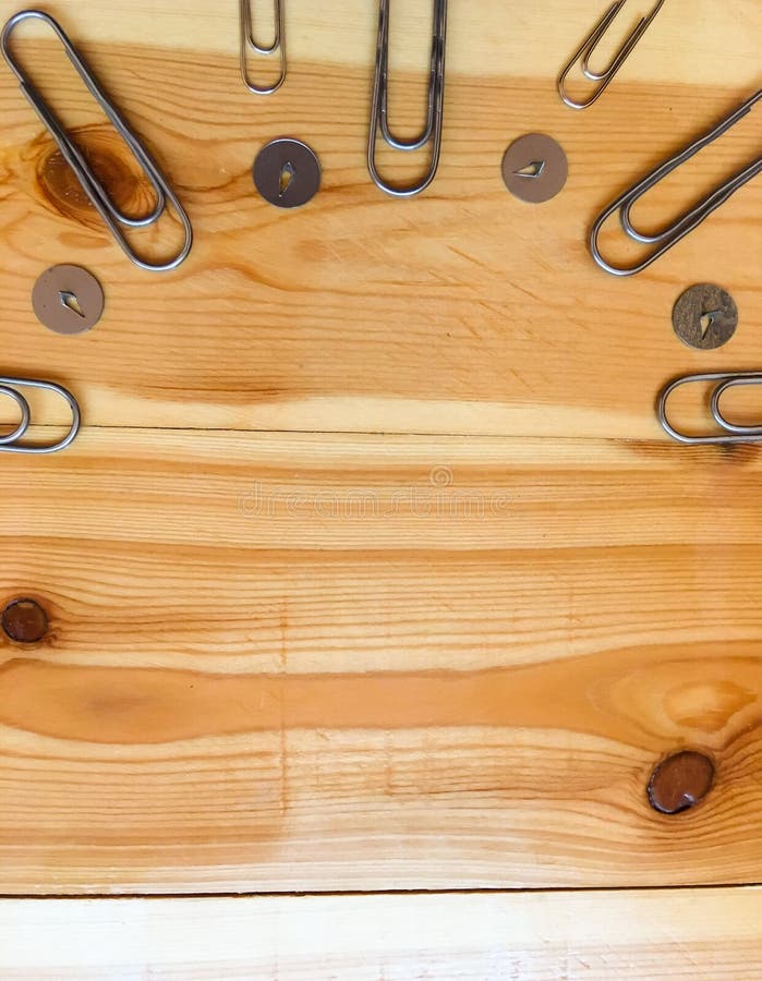 Metal Clips and Pins on a Wooden Table. Place for Text Stock Image ...