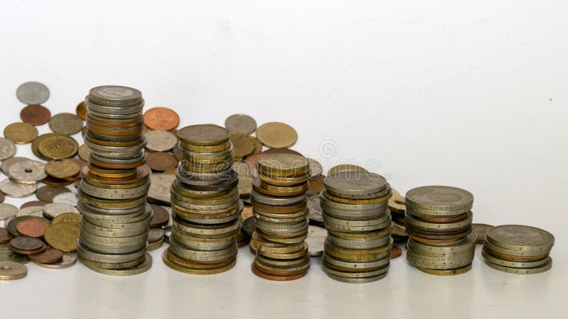 Metal Coins of Different Shapes Countries and Values in Columns of ...