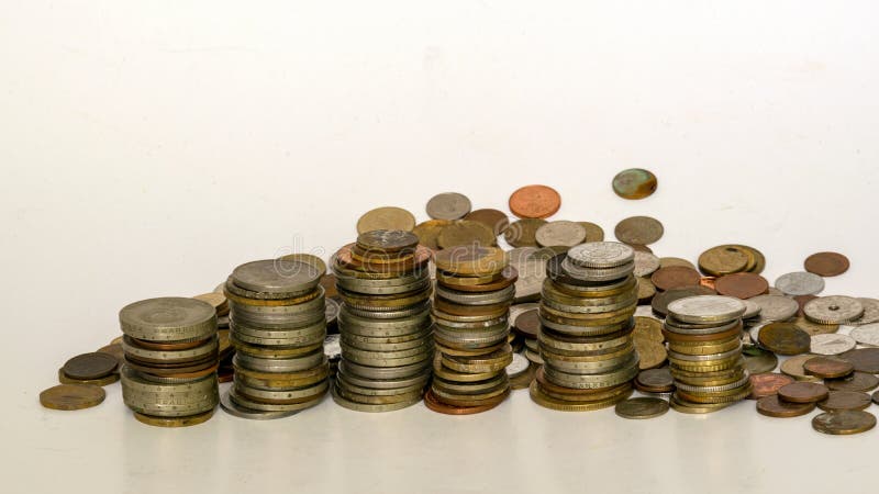 Metal Coins of Different Shapes, Countries and Values, in Columns of ...