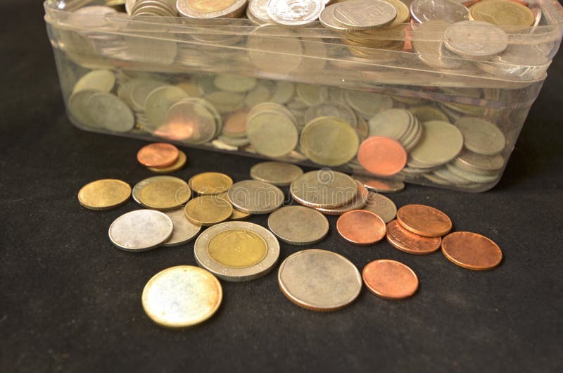 Metal Coins and Plastic Box Stock Photo - Image of bath, bronze: 69972220