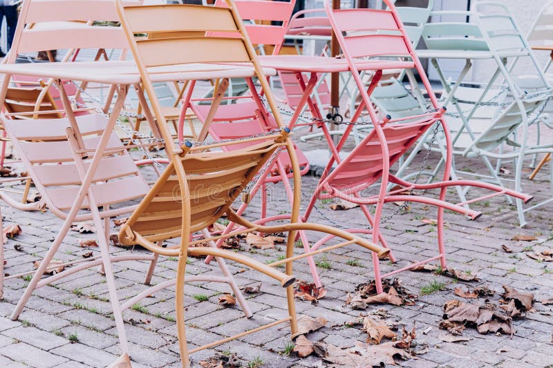 Metal Colored Chairs and Tables in an Out-of-work Street Cafe Stock ...