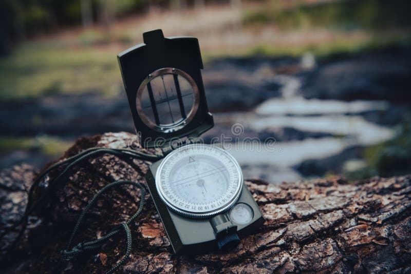 Metal compass in close-up stock photo. Image of guide - 254259350