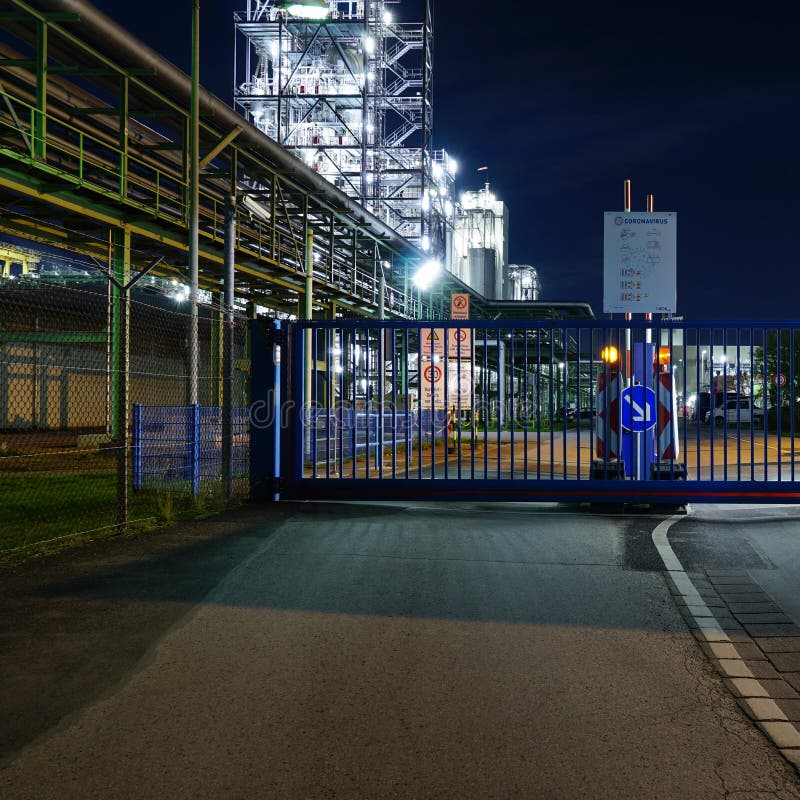Metal Construction with Lights Behind a Gate at Night Editorial Photo ...
