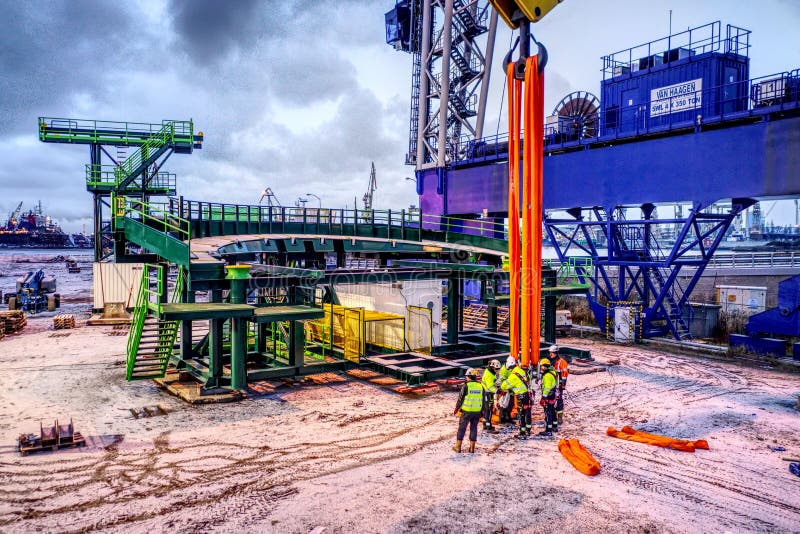 Metal Constructions Loading Onto a Ship by Docks Machinery Editorial ...