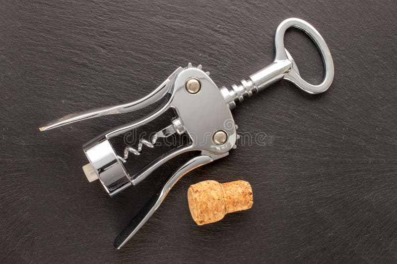 Metal Corkscrew on Slate Stone, Macro, Top View. a Corkscrew is a ...