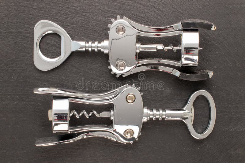Metal Corkscrew on Slate Stone, Macro, Top View. a Corkscrew is a ...